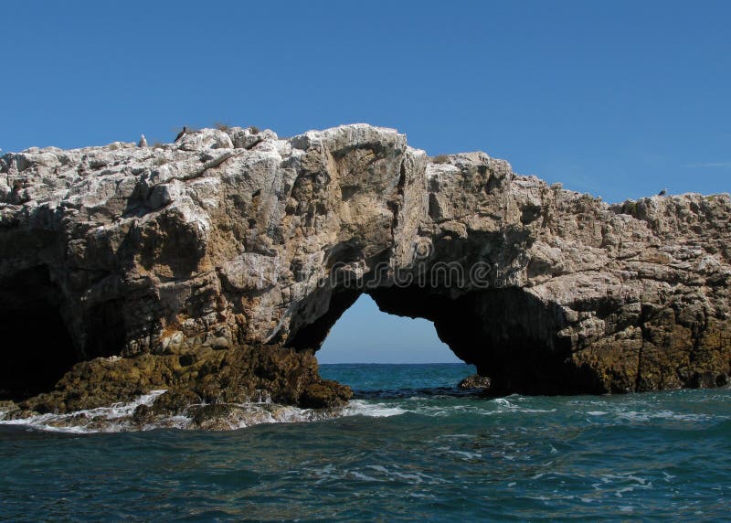 Stone Arch at Islas Marietas Stock Photo - Image of opening, crashing ...