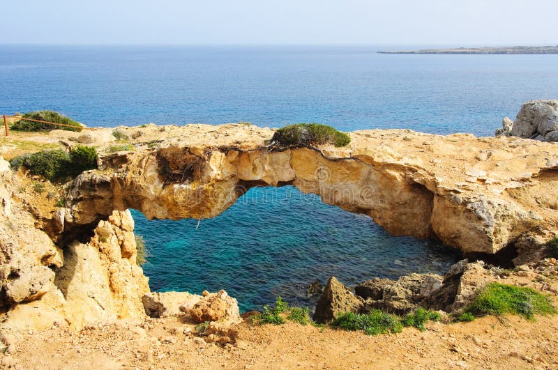 Stone arch over sea stock image. Image of mediterranean - 13231513