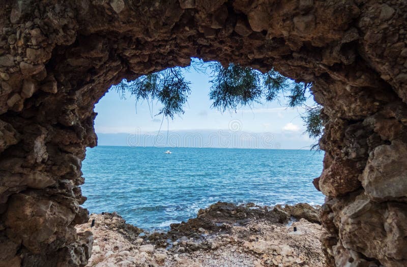 View Of The Mediterranean Sea Through A Stone Arch Stock Image - Image ...