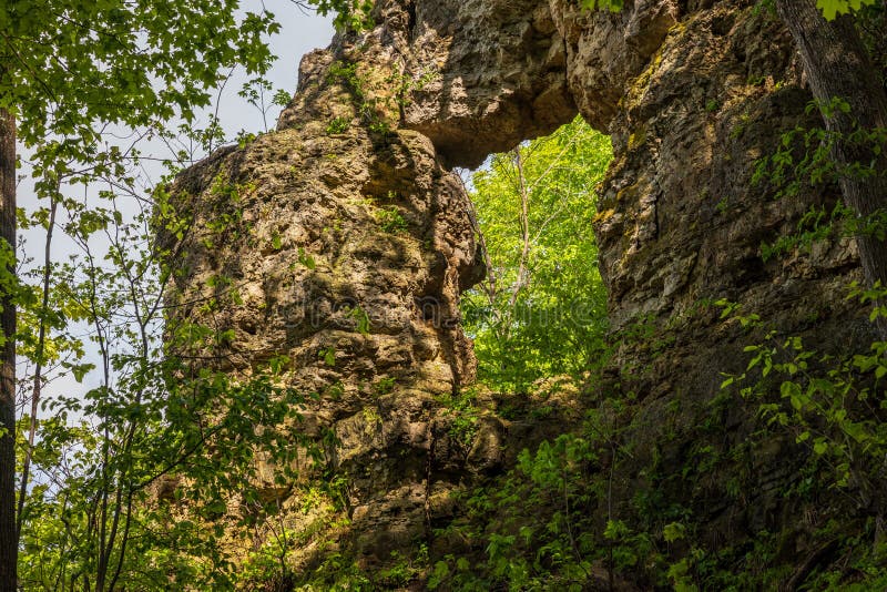 A Stone Arch in the Woods during Spring Stock Photo - Image of state ...