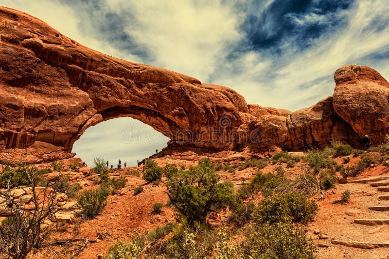 Stone Arches with Steps Going Up the Rocks Side and Trees Along the ...