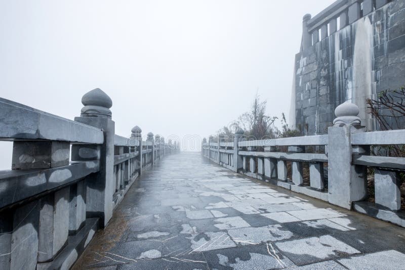 Stone Rail and Walkway with Misty on Hill Stock Image - Image of design ...