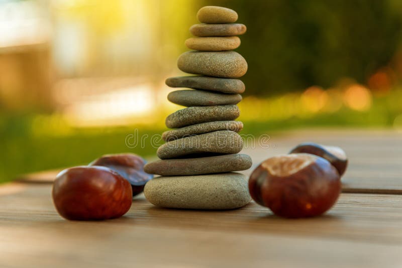 Stone balance in autumn stock image. Image of beauty - 78665147
