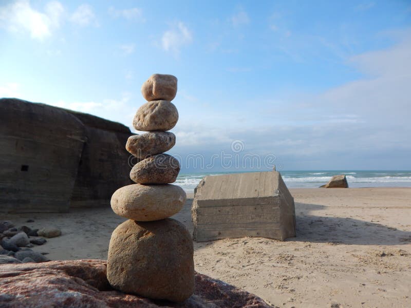 Stone balance on the beach stock photo. Image of monument - 204632192