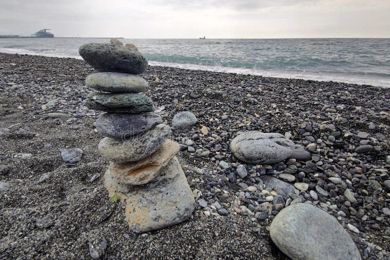 Stone Balancing on the Beach Stock Photo - Image of stack, coast: 214622558
