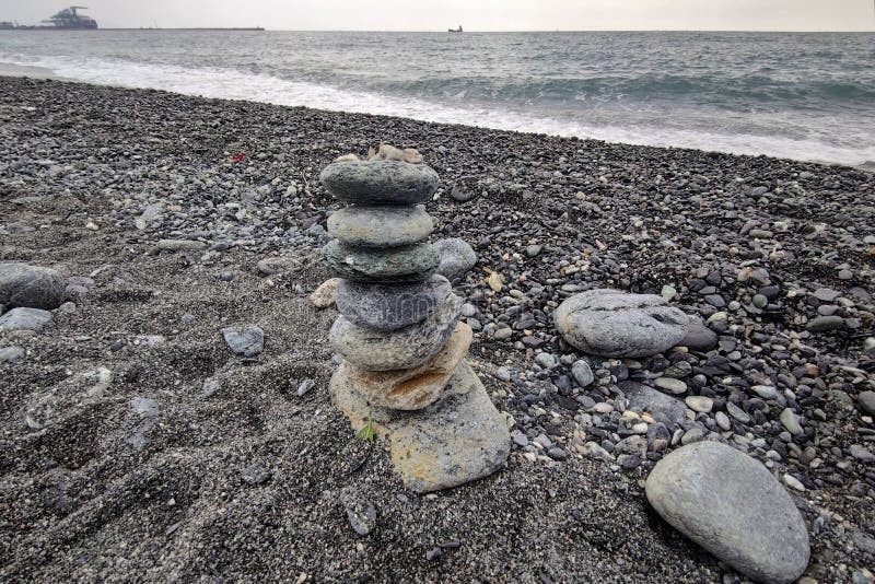 Stone Balancing on the Beach Stock Photo - Image of water, simplicity ...