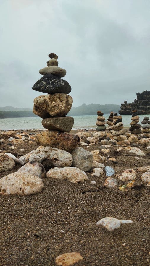Stone Balancing at the Beach Stock Photo - Image of soil, beach: 284969094