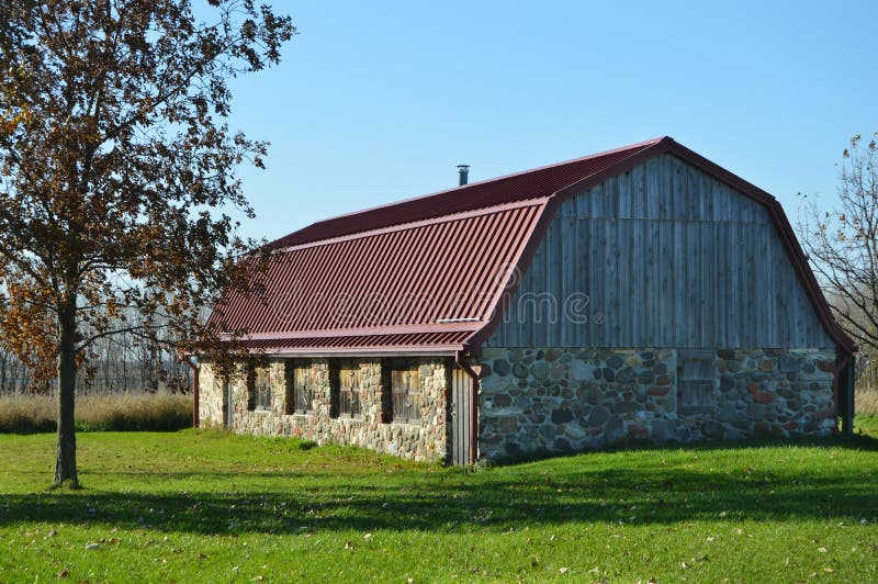 Red Barn with Stone Silo and Cone Top Stock Image - Image of farming ...