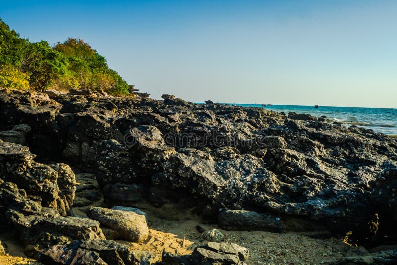 Stone on the beach stock photo. Image of summer, relaxation - 243803208