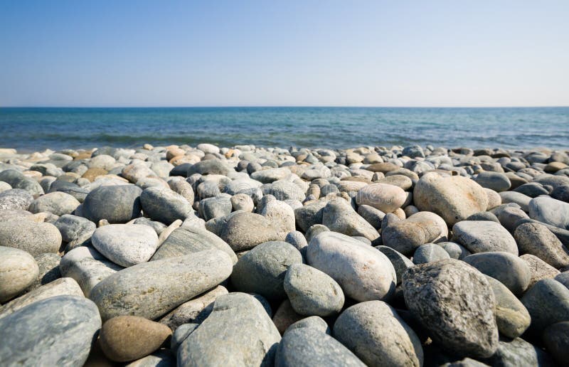 Round stones and clear sea stock image. Image of bottom - 20506523