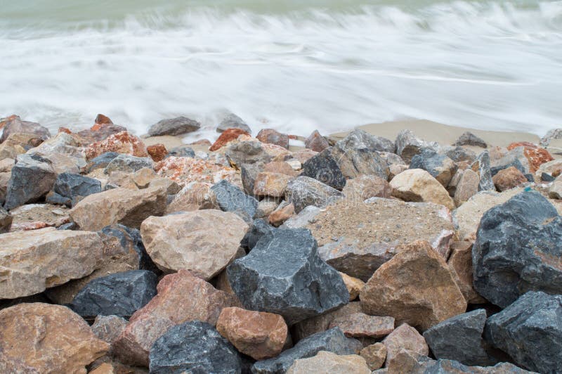 Stone on the beach stock photo. Image of outdoor, sunrise - 57439892