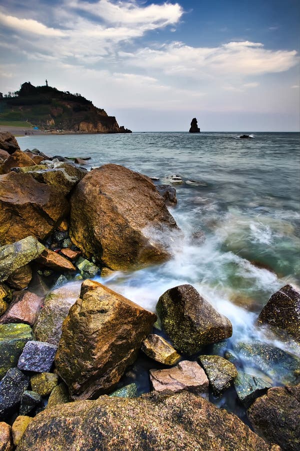 Stone at beach stock photo. Image of water, scenic, coastline - 9460504