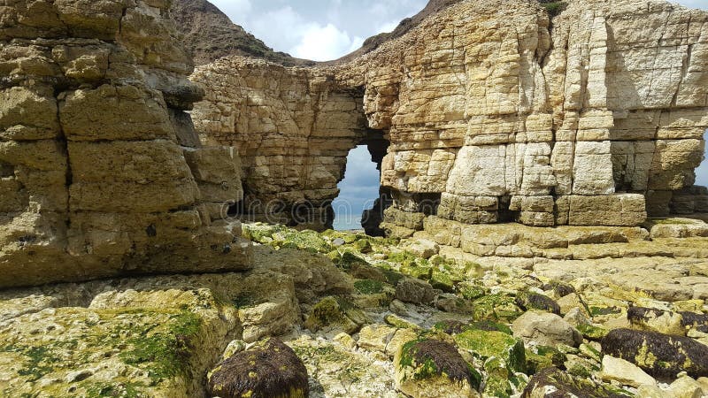 Stone beach stock photo. Image of stone, beach, cave - 118262408
