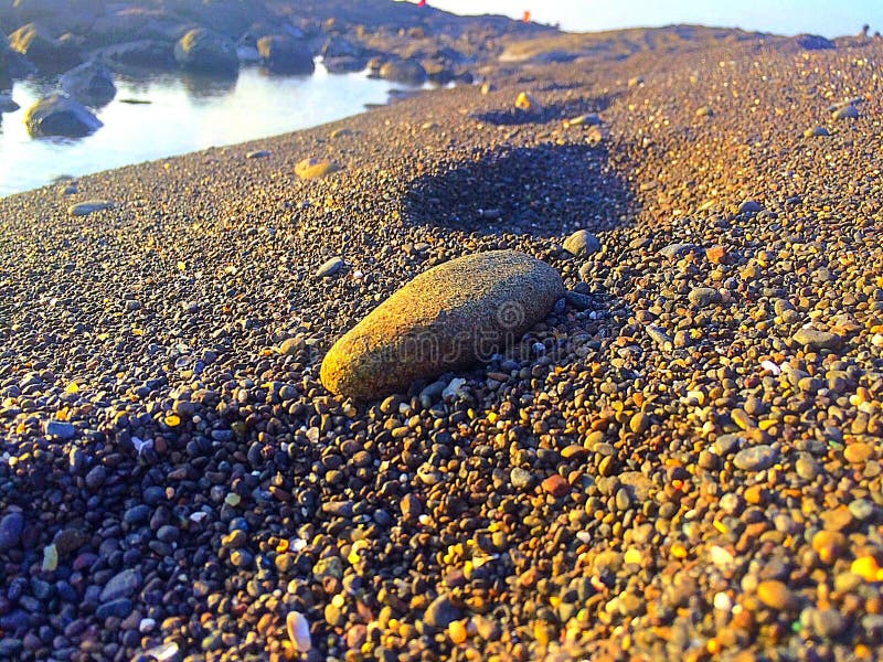 Stone beside the beach stock image. Image of colourful - 150895979
