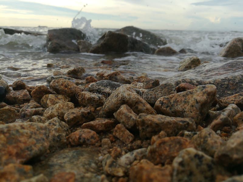 Stone beach stock image. Image of water, beach, stone - 107061427