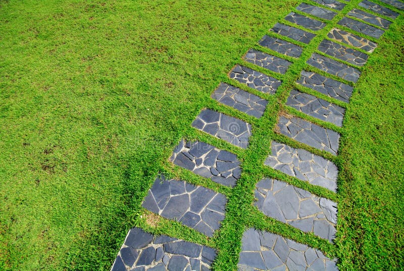 Grid of Grass and Paving Stones Stock Photo - Image of beige, stone ...