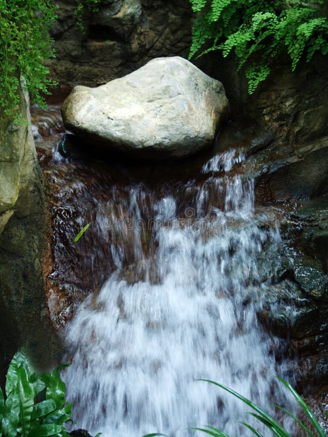 Stone blocking waterfall stock photo. Image of beauty - 12767290