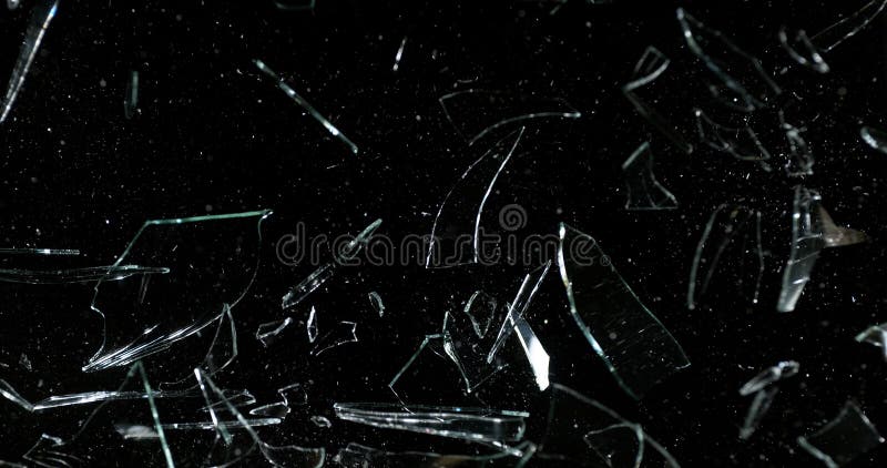 Stone Breaking Pane of Glass Against Black Background Stock Image ...