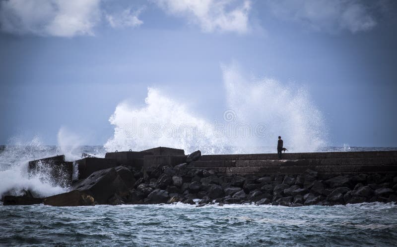 Stone Breakwater with Breaking Waves. Stock Photo - Image of blue ...