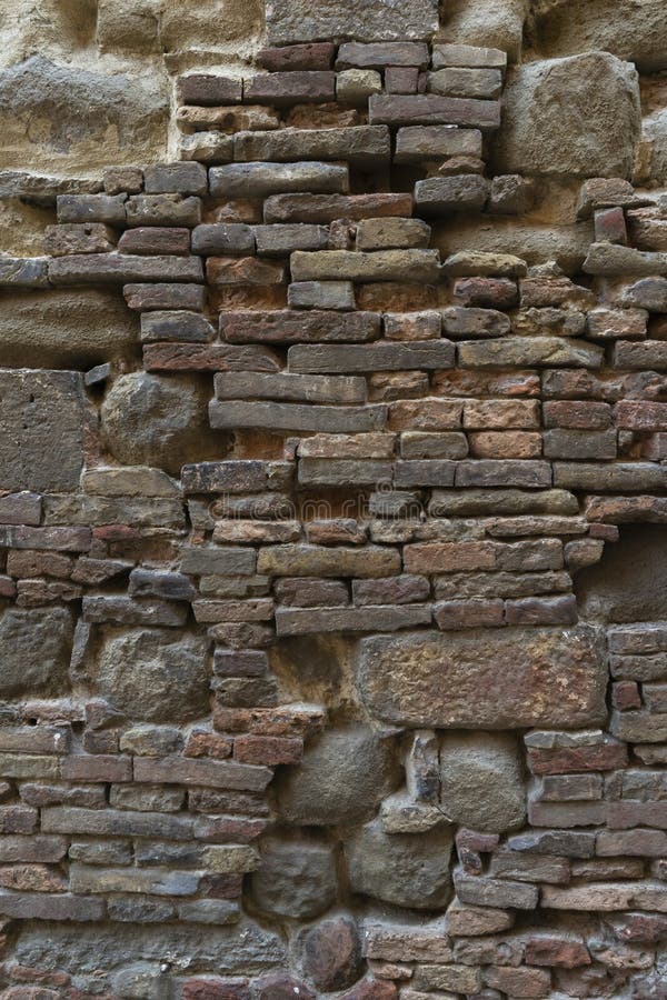 Rustic Stone Wall Texture. The Wall Is Made Of Red Bricks,cement And ...