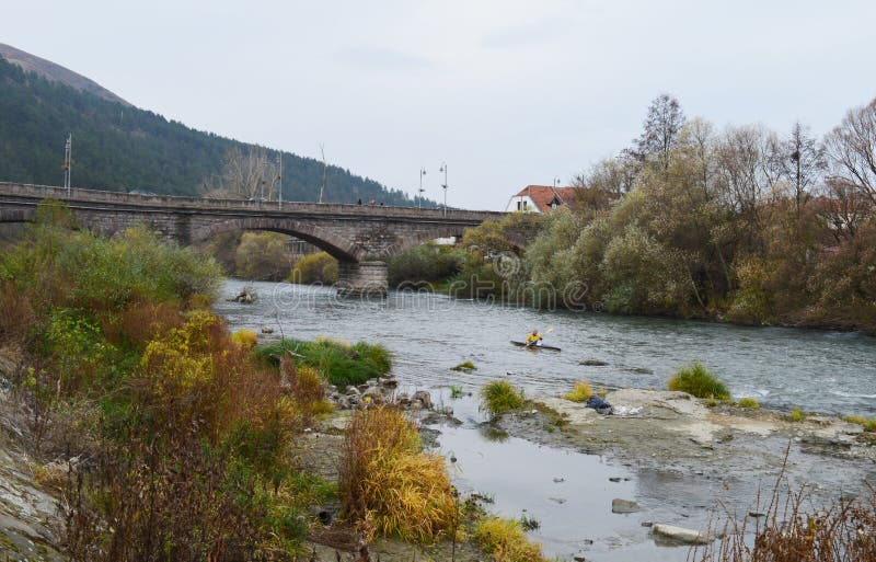 Stone bridge in autumn editorial photography. Image of hill - 133386572