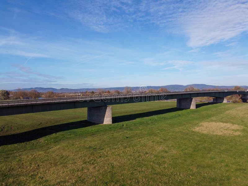 Stone Bridge and Land Covered with Green Grass Under it Stock Photo ...
