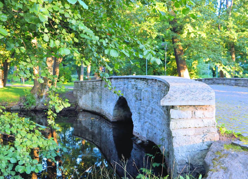 Stone Bridge Over the Canal Stock Image - Image of autumn, path: 193741149
