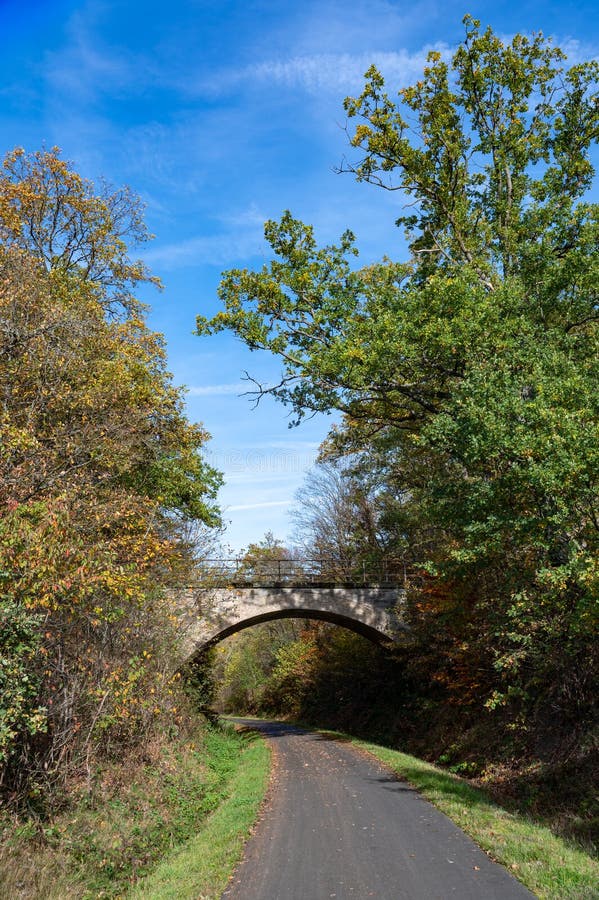 A Stone Bridge Over a Narrow Path Stock Image - Image of travel, street ...