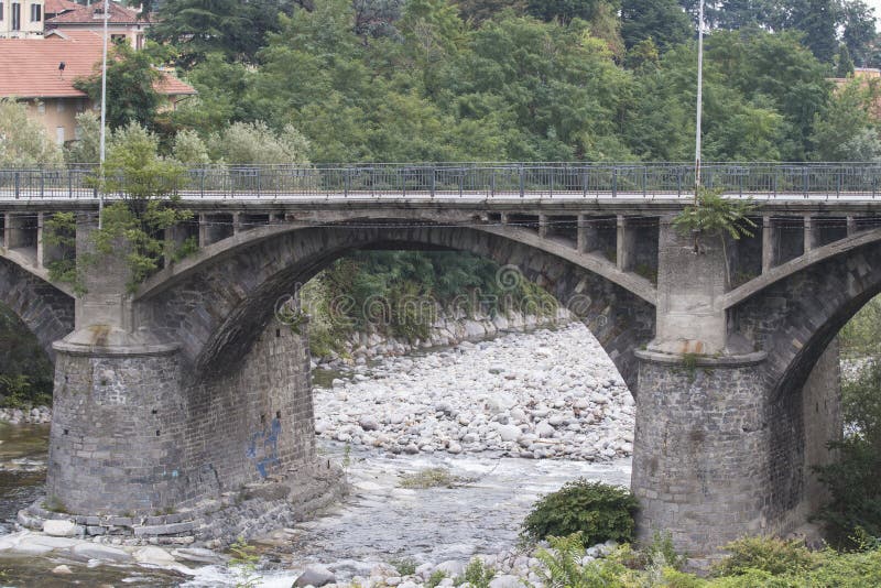 Stone bridge over a river stock image. Image of water - 63062345