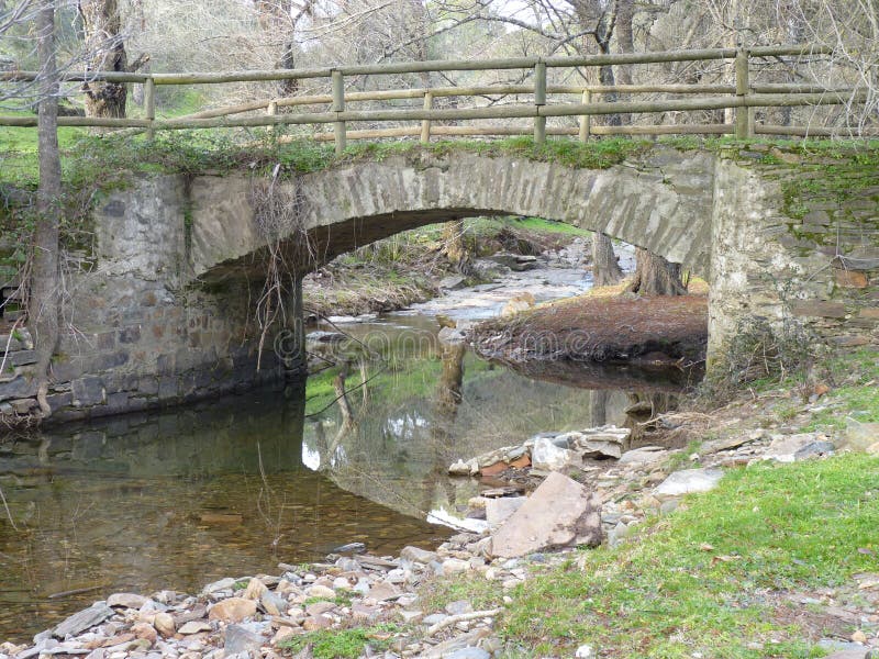 Stone bridge over river stock photo. Image of historic - 99810064