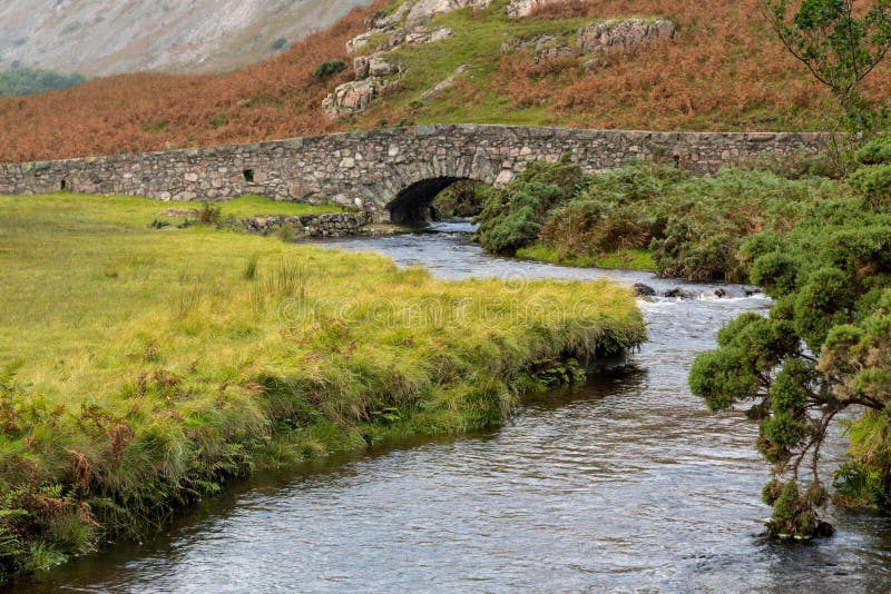 Stone Bridge Over River by Wastwater Stock Photo - Image of hills ...