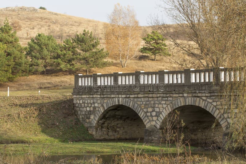 Stone Bridge Over Small River Stock Image - Image of outdoors, stone ...