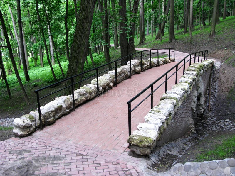 Stone bridge in park stock photo. Image of brick, bridge - 5502934