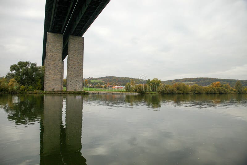 Stone Bridge Reflected in a Calm Lake Stock Image - Image of trees ...