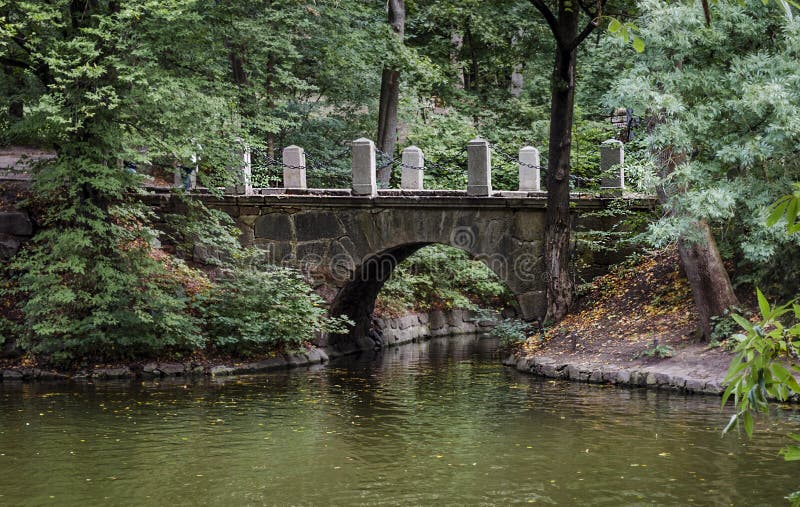 Stone Bridge on the River in Autumn Stock Image - Image of ukrainian ...