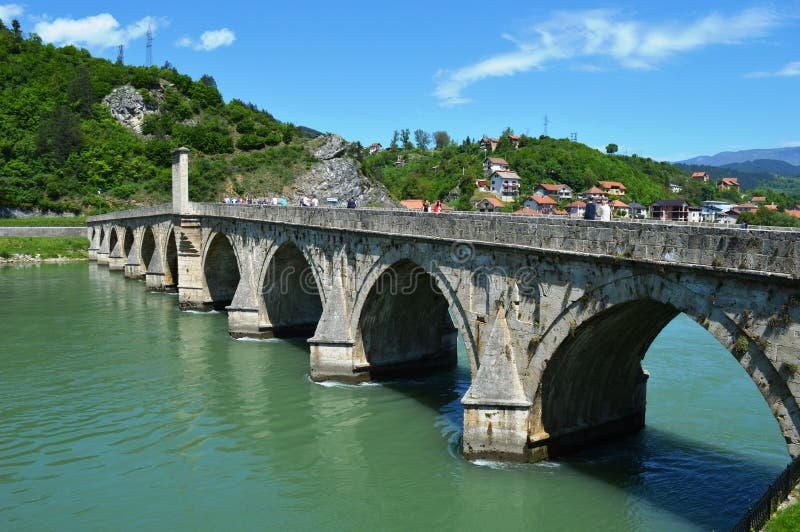 Stone bridge on the river editorial stock image. Image of color - 149201849