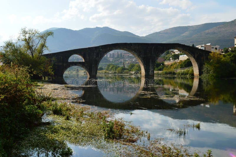Stone bridge in river stock image. Image of river, city - 158549859