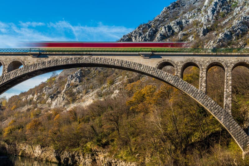 Stone bridge with train stock image. Image of train, world - 71274595