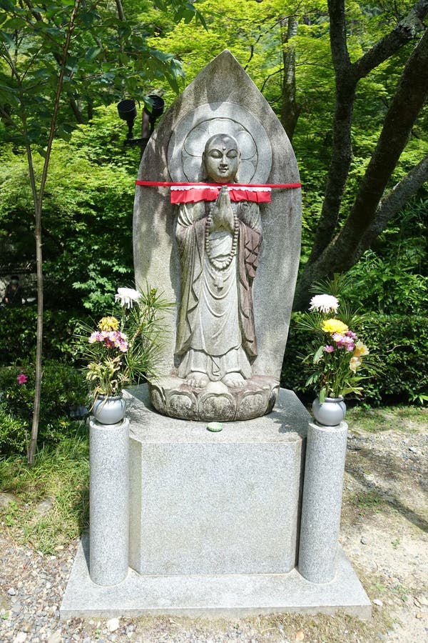 Stone Buddha with Hands Clasped on Lotus. Stock Image - Image of green ...