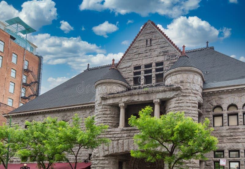 Round Stone Building And Red Awnings Stock Photo - Image of background ...