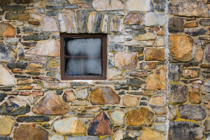 Stone building with window stock photo. Image of abstract - 136515388