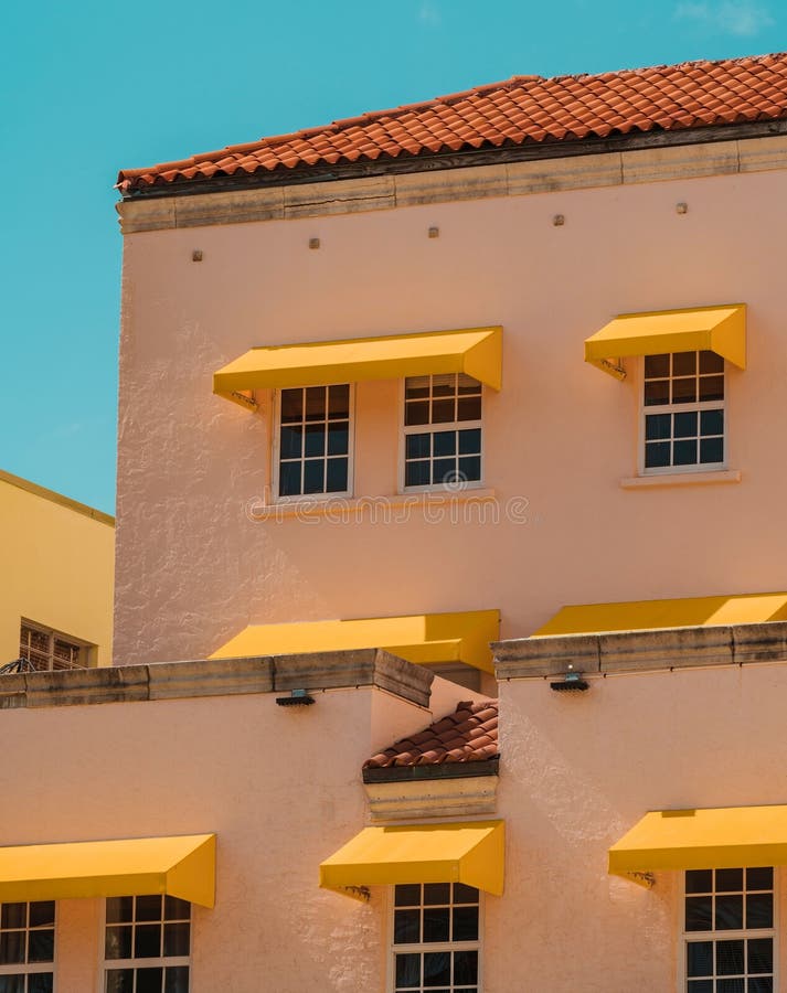 Stone Building with Yellow Canopy Windows Stock Image - Image of ... Stone Building with Yellow Canopy Windows Stock Image - Image of ...