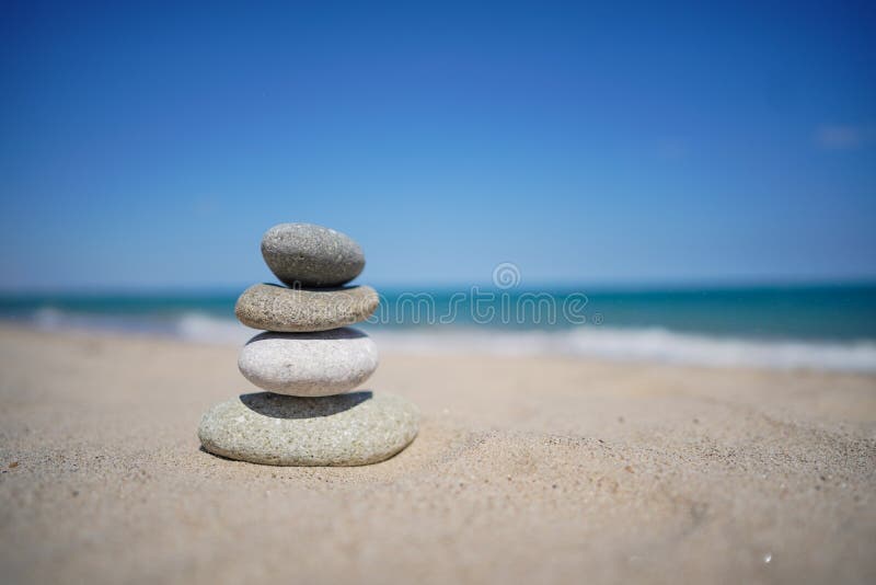 Stone Cairn at a White Sand Beach Stock Image - Image of sunny ...