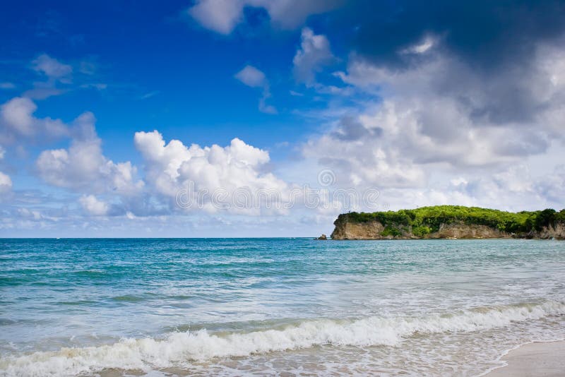 Stone Cape in Ocean with Blue Sky Stock Photo - Image of bright, gray ...