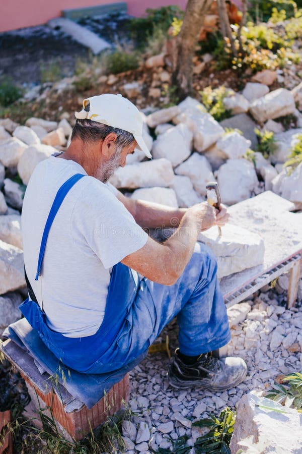 Stone carver stock image. Image of manual, hammer, artisan - 185157963