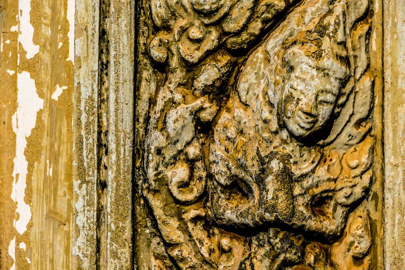 A Stone Carving of a Face with a Beard and a Beard Stock Photo - Image ...