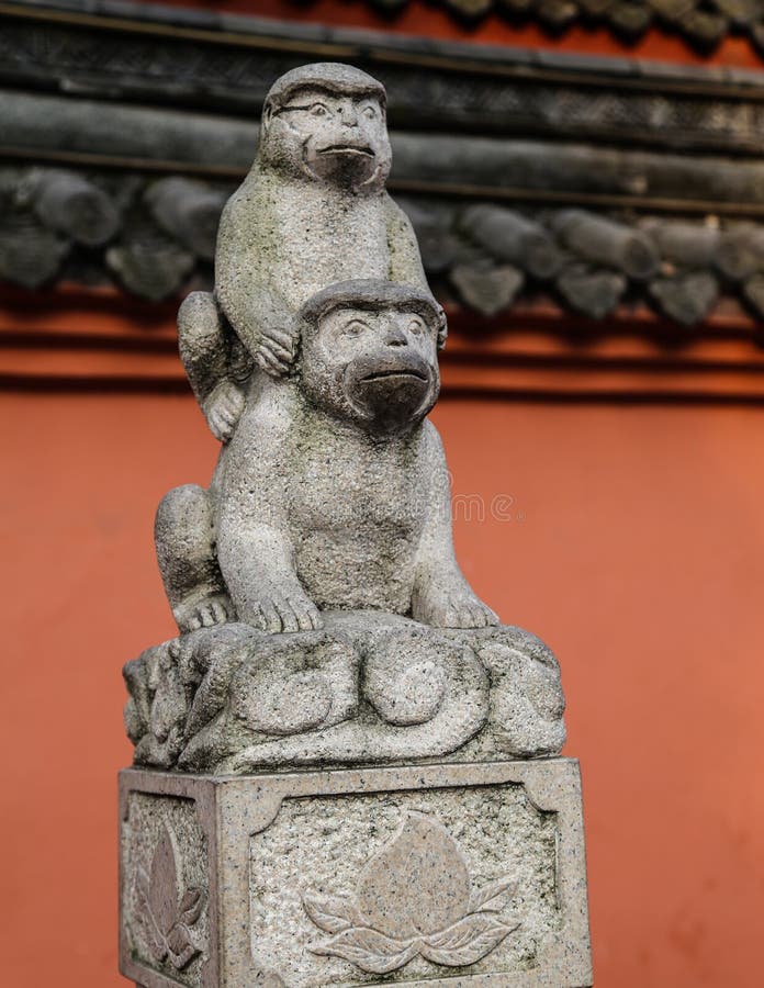 Monkey on stone carving stock photo. Image of bali, demonic - 63626624