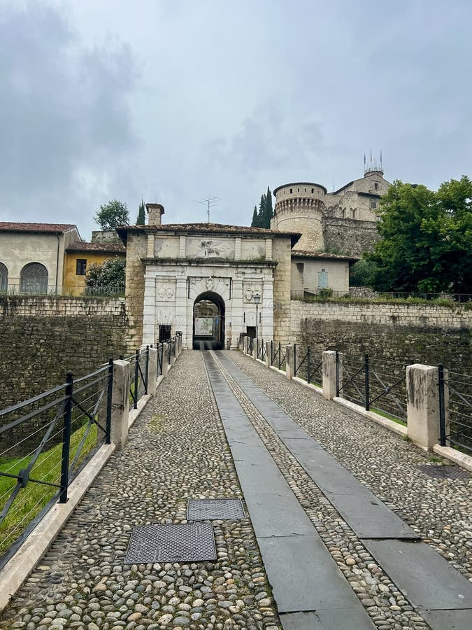 Ancient European Castle with Round Tower and Walkway Along the Top of ...