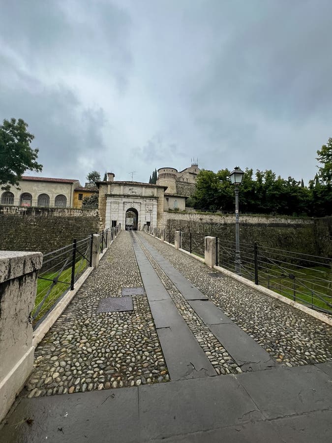 Ancient European Castle with Round Tower and Walkway Along the Top of ...