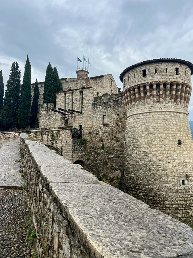 Ancient European Castle with Round Tower and Walkway Along the Top of ...